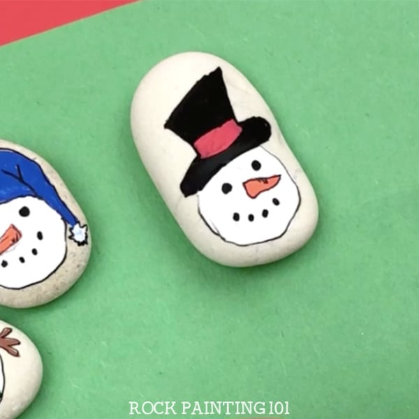 How to make snowman painted rocks for an amazing gift!