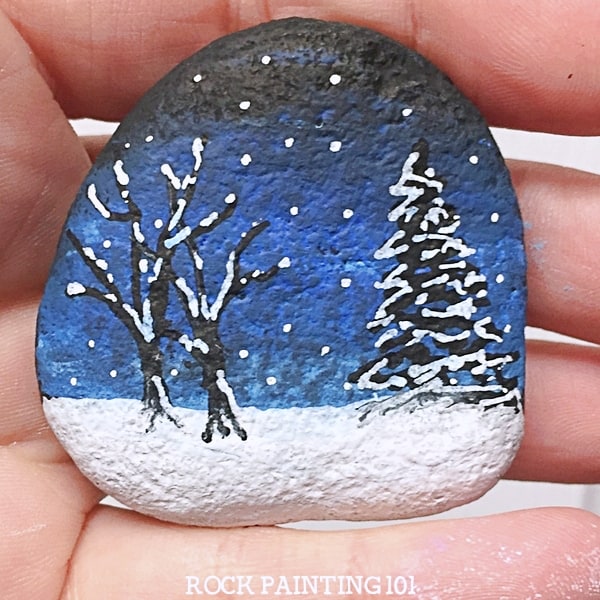 How to make this beautiful winter scene rock painting idea