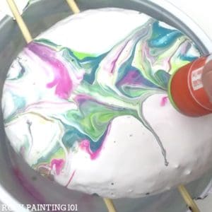 Pour painting techniques that create beautiful painted rocks